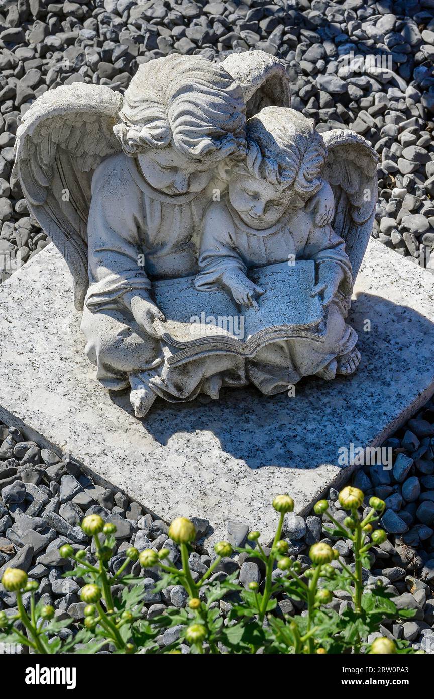 Angel reading hi-res stock photography and images - Alamy