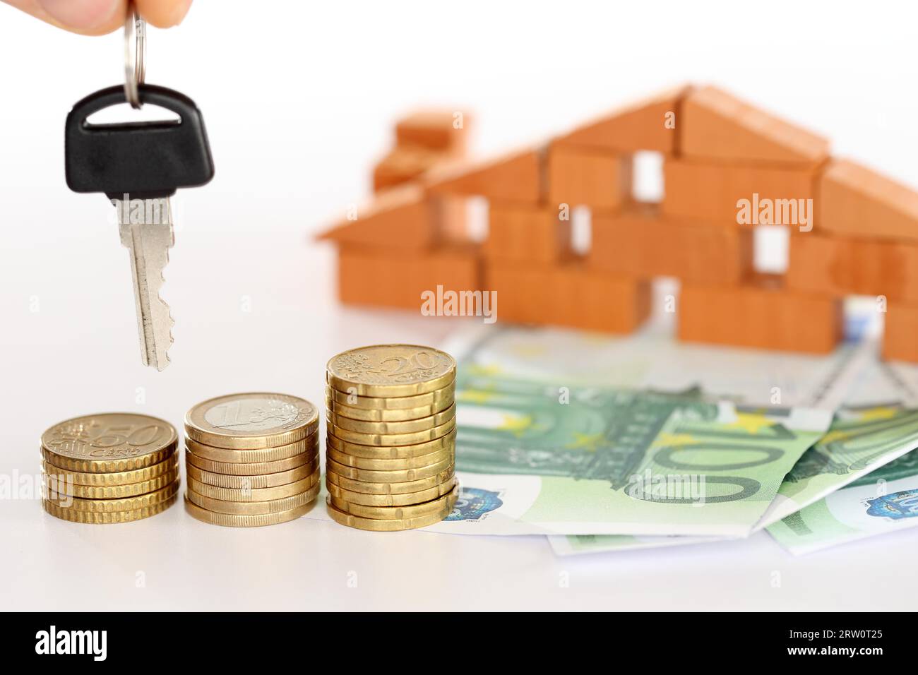 Key symbol with shell Stock Photo - Alamy