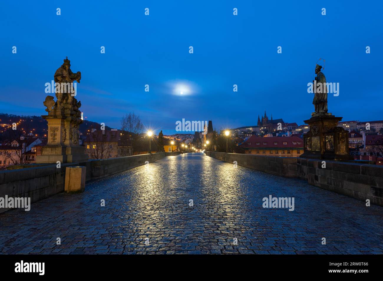 View from the Charles bridge in Prague over the Vlatva river at night ...