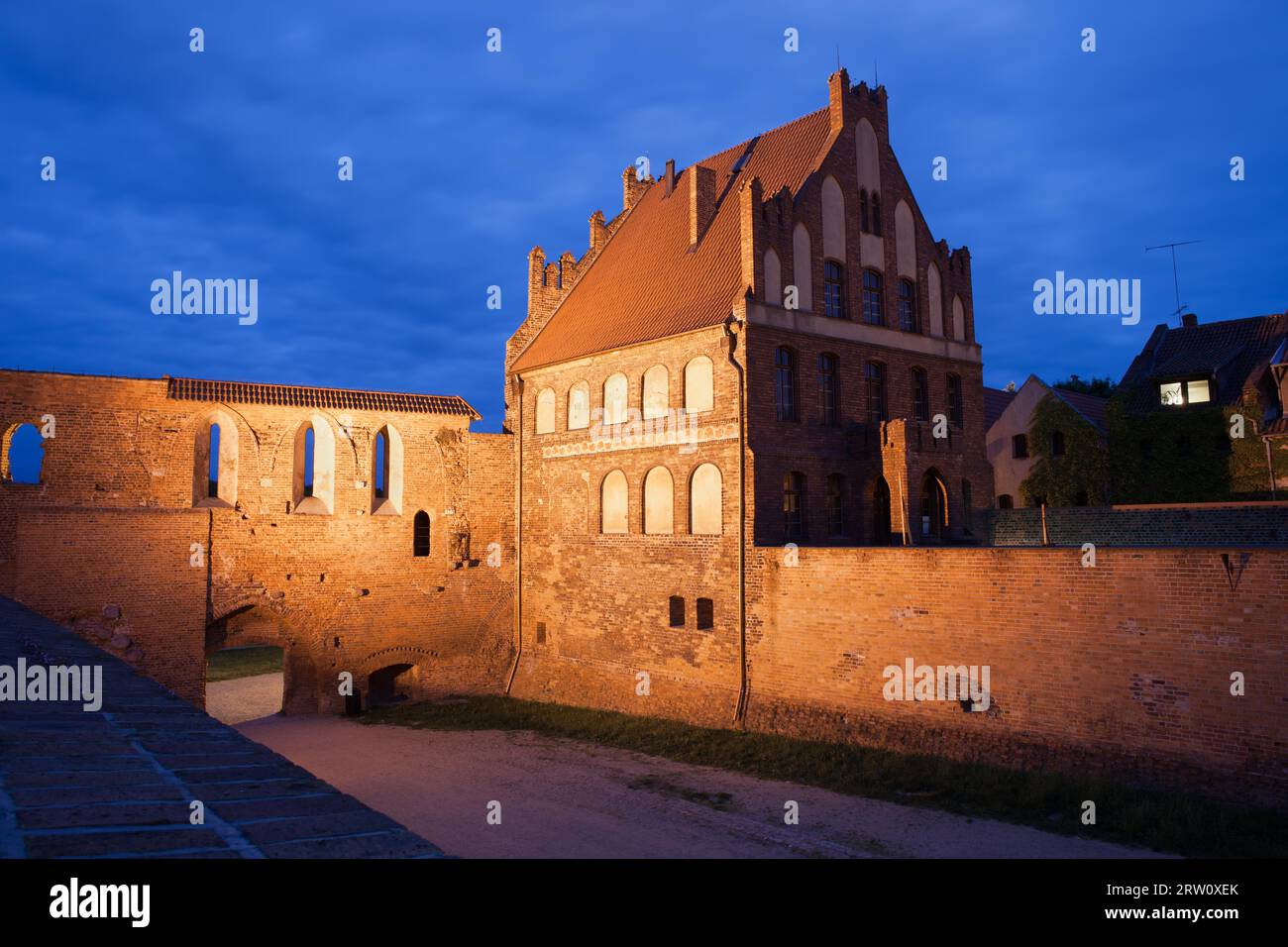 Citizen Court by night and city wall in Torun, Poland, former summer ...