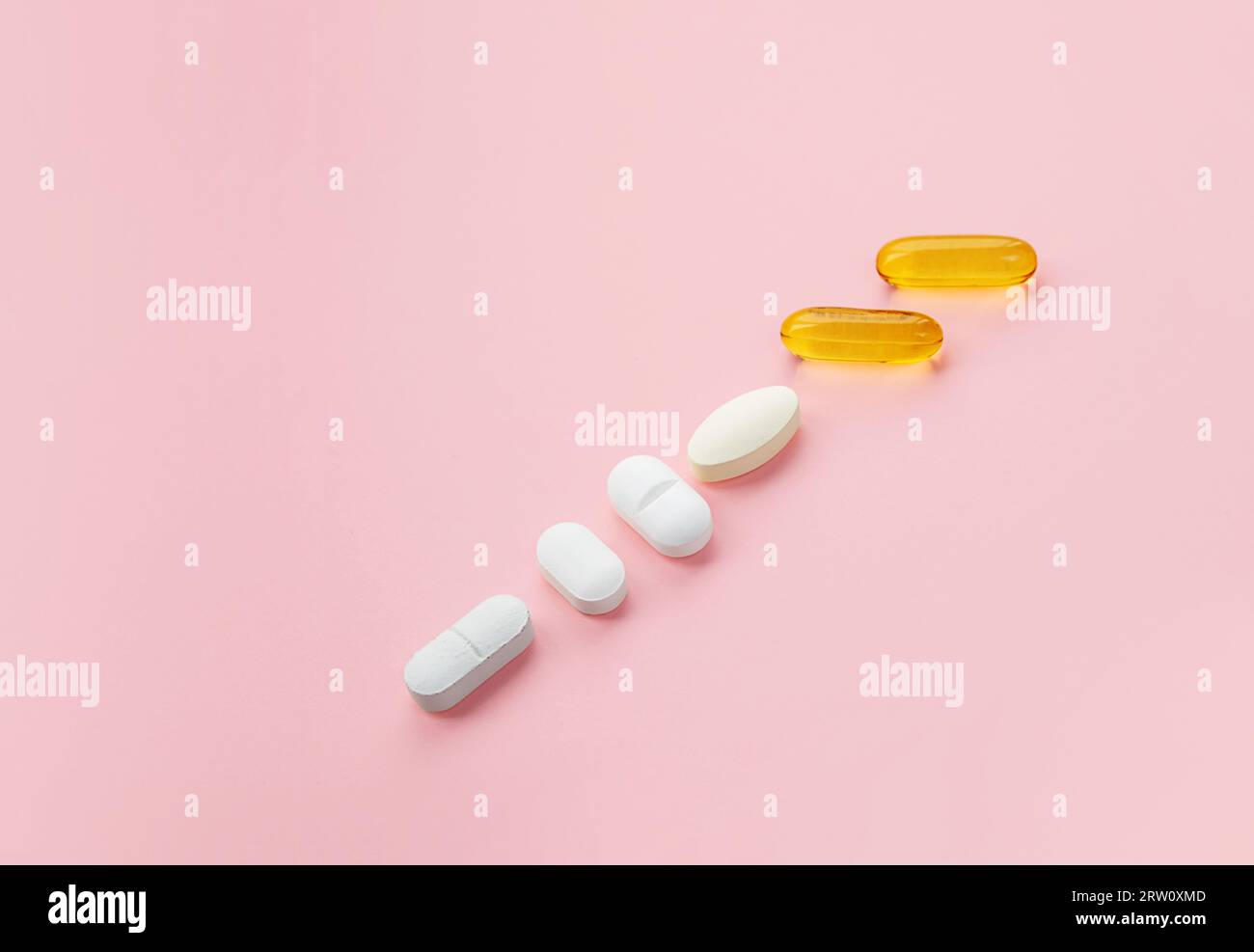 Daily vitamin dosage. Some various pills layout Stock Photo - Alamy