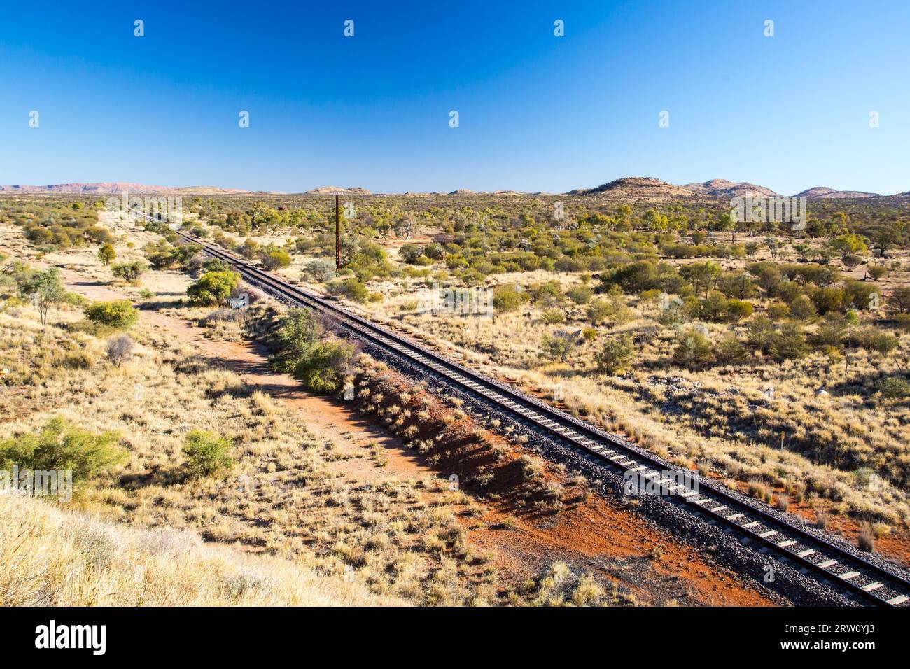 The famous Ghan railway near Alice Springs extends all the way to ...