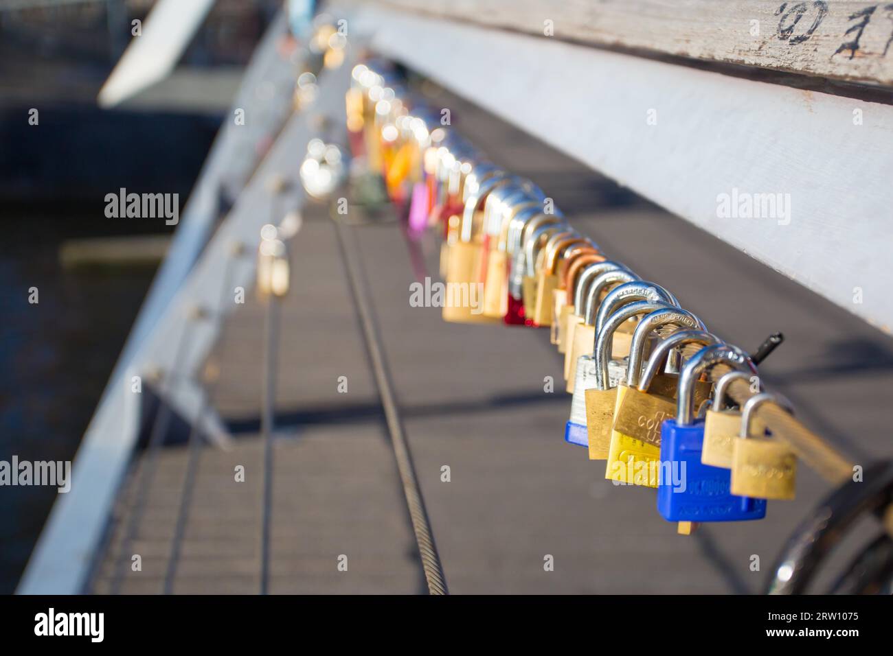 Padlocks hang on Melbourne's famous Southbank Pedestrian Bridge as ...