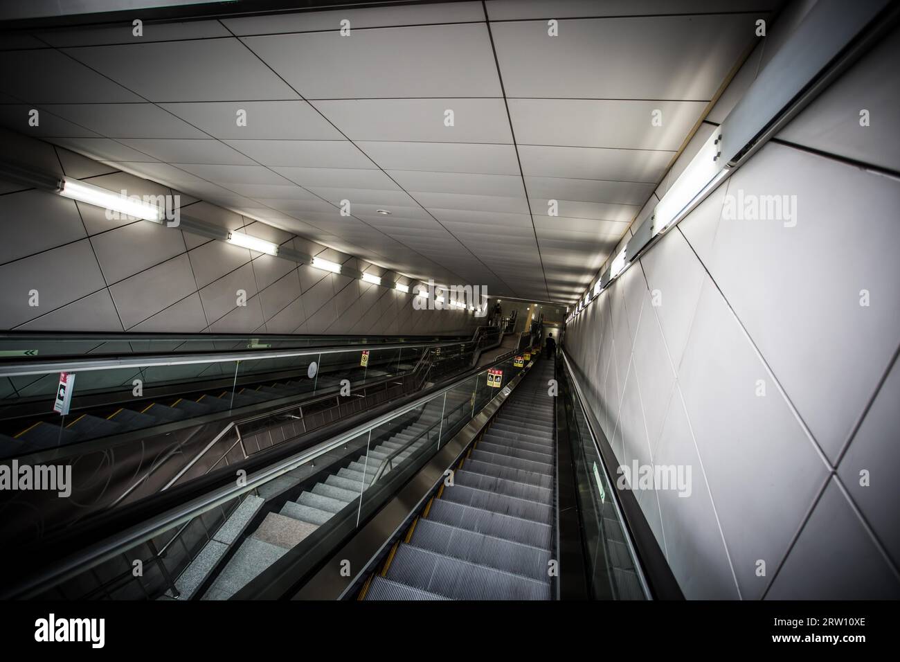 Escalators exit hi-res stock photography and images - Alamy