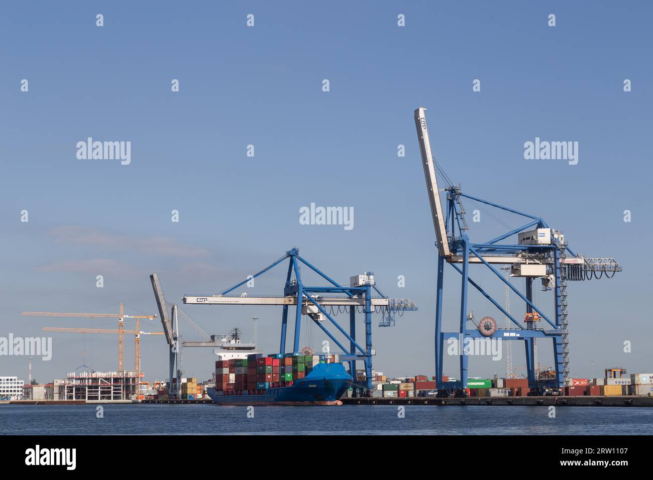 Copenhagen, Denmark, August 6, 2015: Cargo ship is being unloaded at ...