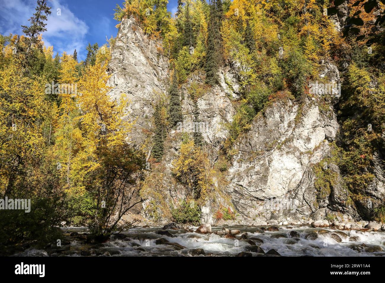 Scenic view of the towering walls of Little Su river with fall foliage ...