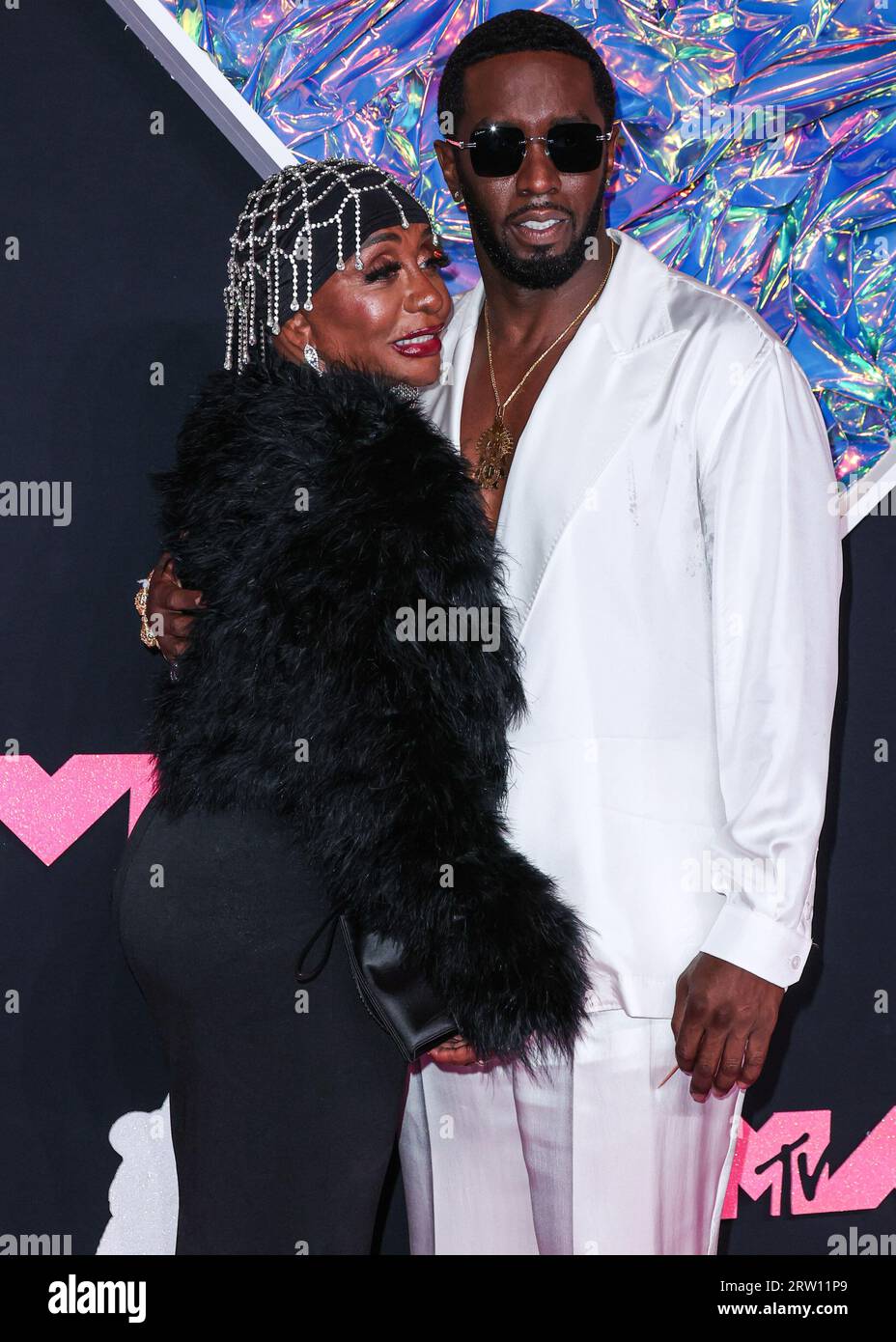 NEWARK, NEW JERSEY, USA - SEPTEMBER 12: Janice Combs and son Diddy ...