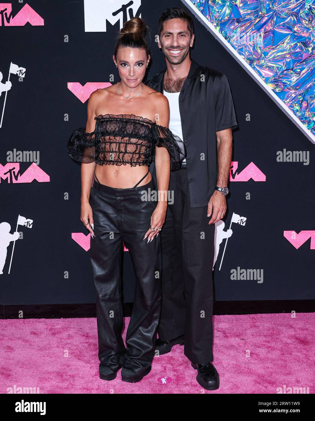 NEWARK, NEW JERSEY, USA - SEPTEMBER 12: Laura Perlongo and Nev Schulman ...