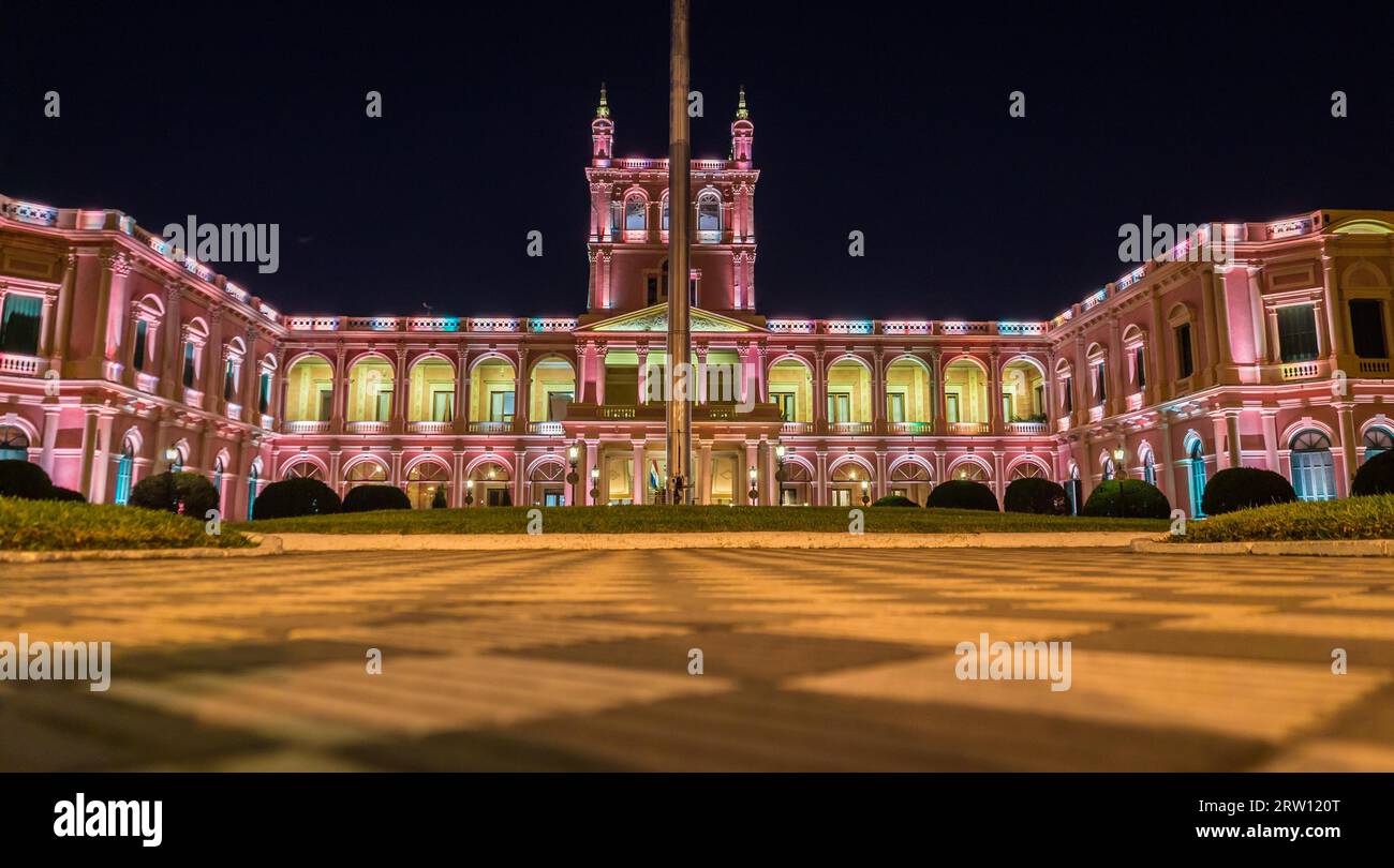 View on illuminated presidential palace in Asuncion, Paraguay. The pink ...