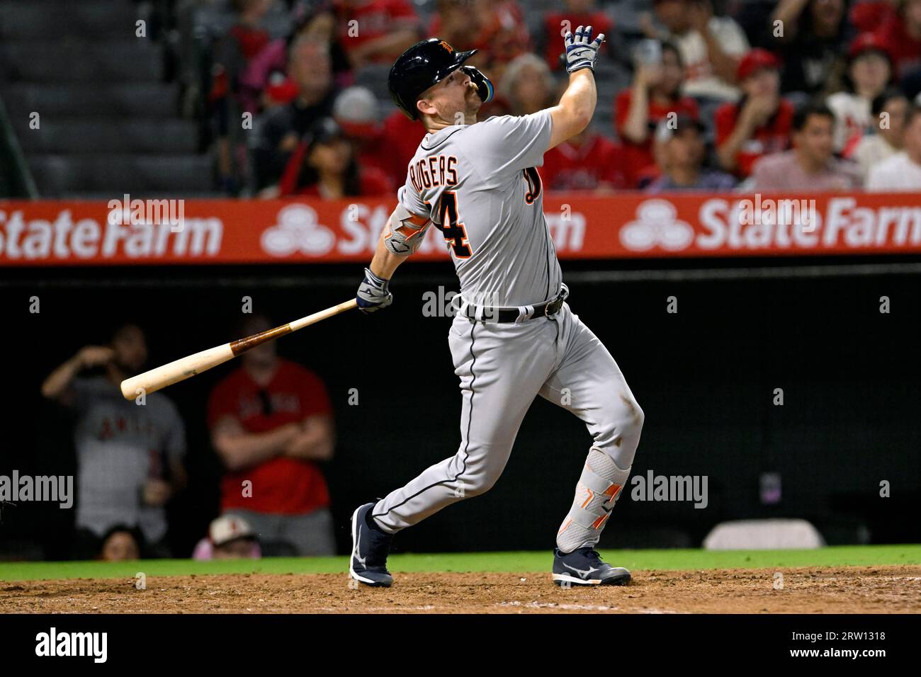 Detroit Tigers' Jake Rogers follows through to hit a solo home against ...