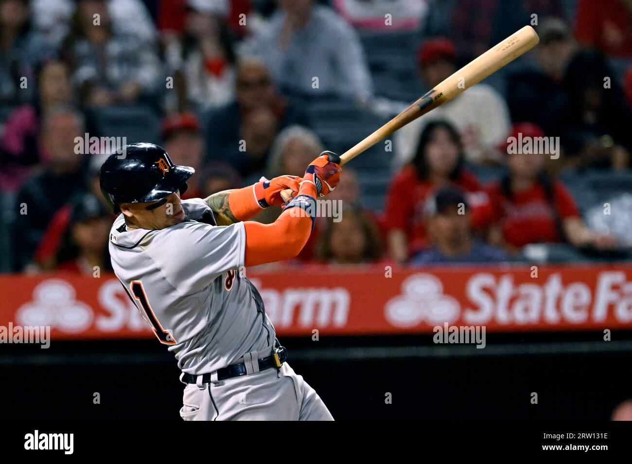 Detroit Tigers' Javier Baez follows through to hit a three-run double ...