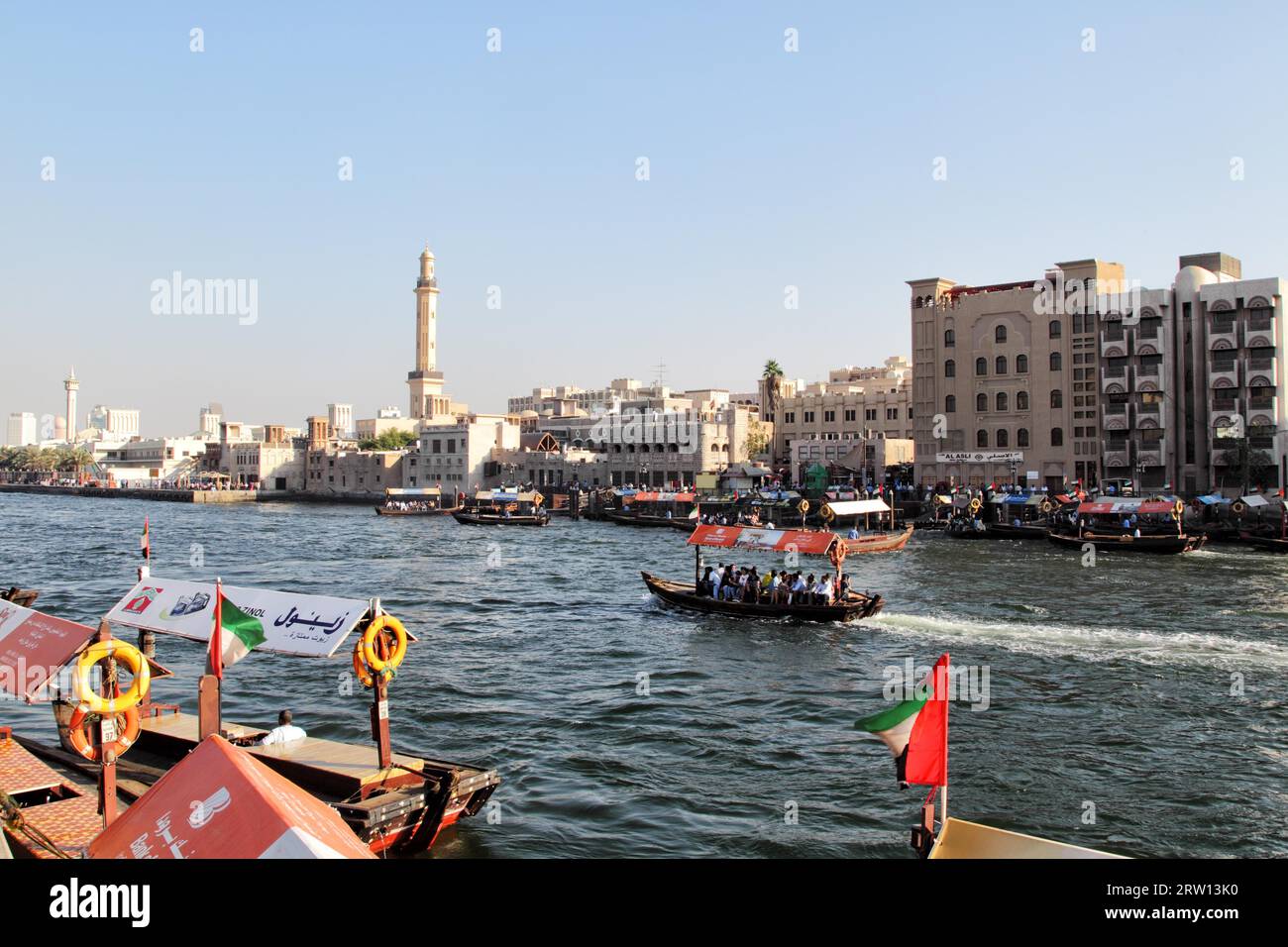 View over the Dubai Creek from Deira to Bur Dubai. Abras, the typical ...