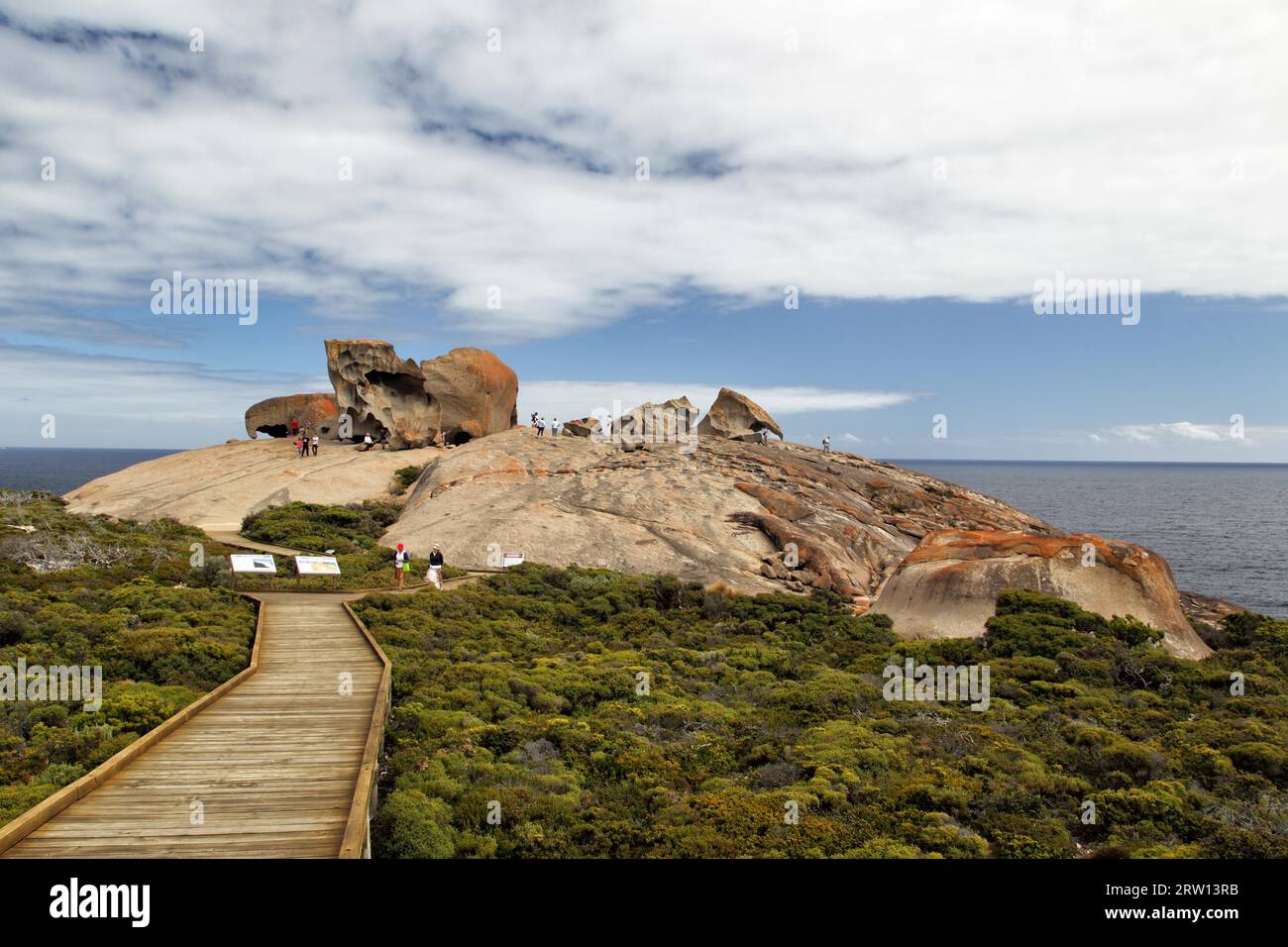 Tourists at the Remarkable Rocks, a natural rock formation, in Flinders ...