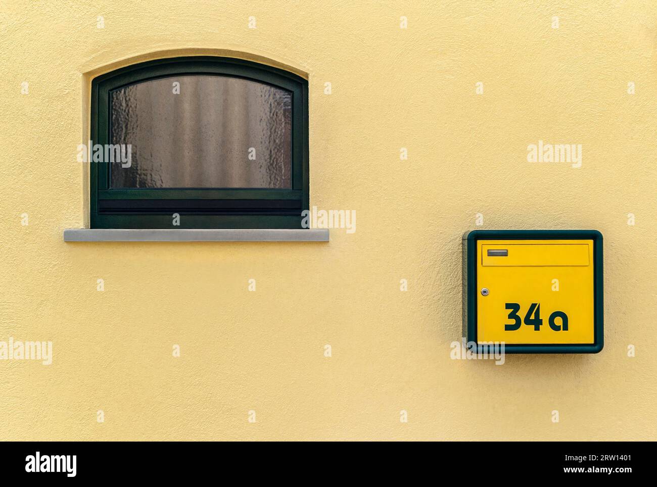 Formal elements, window with mailbox Stock Photo - Alamy