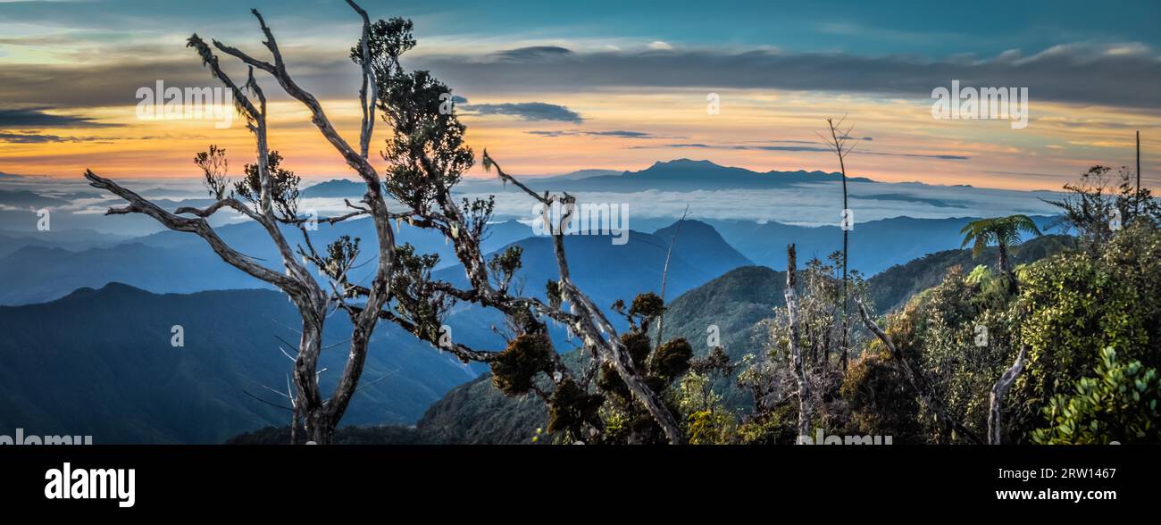 Panoramic photo of mountains at sunrise in Digne in Kubor range, Papua ...
