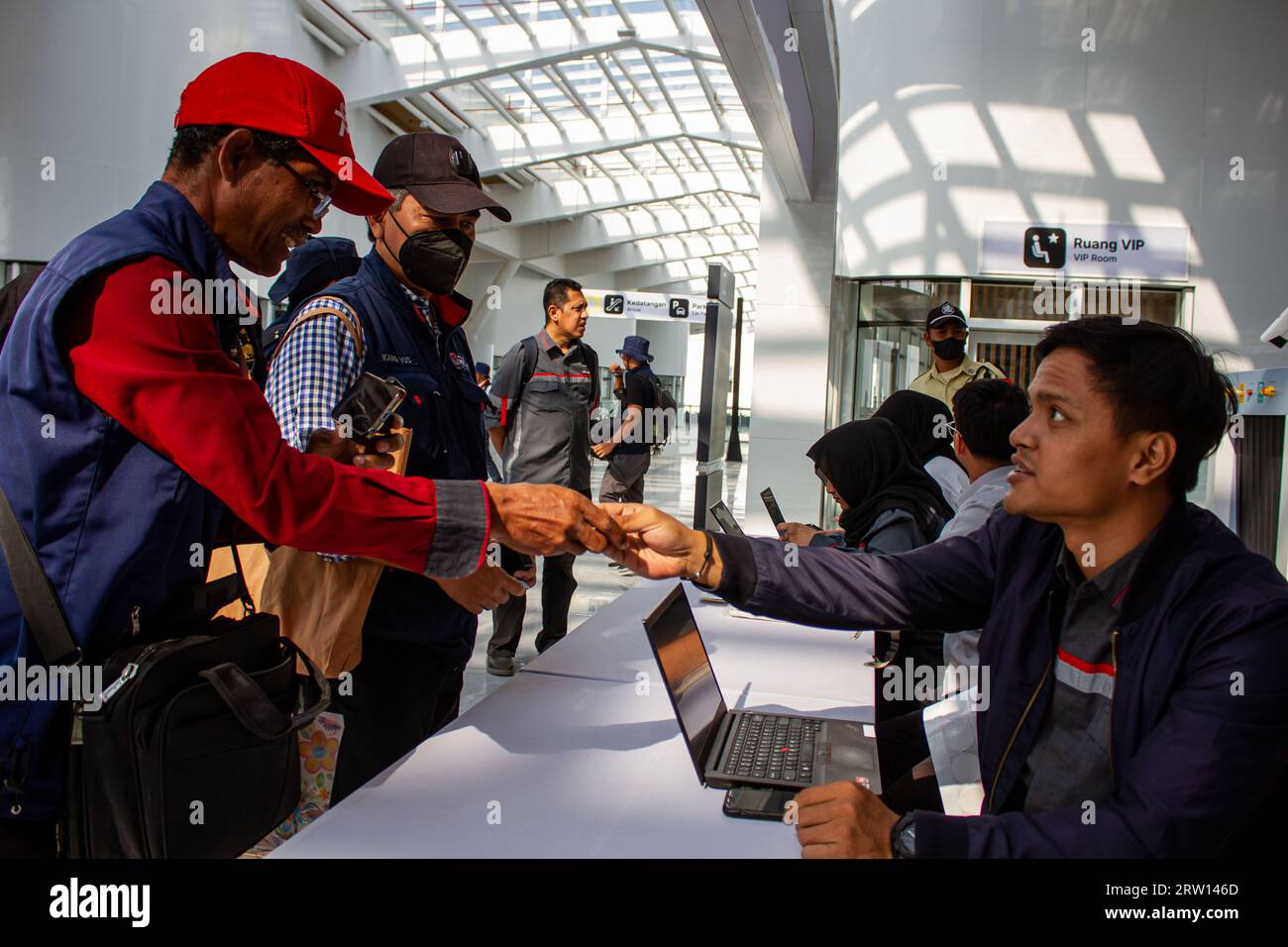 Bandung, West Java, Indonesia. 16th Sep, 2023. Residents queue to get ...