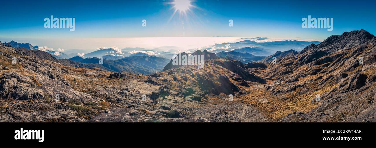 Panoramic photo of sunrise on Mount Wilhelm, Papua New Guinea. This is ...