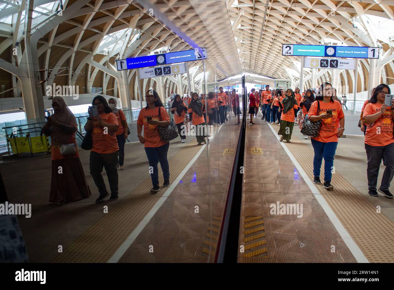 Jakarta, West Java, Indonesia. 16th Sep, 2023. People walk into train ...