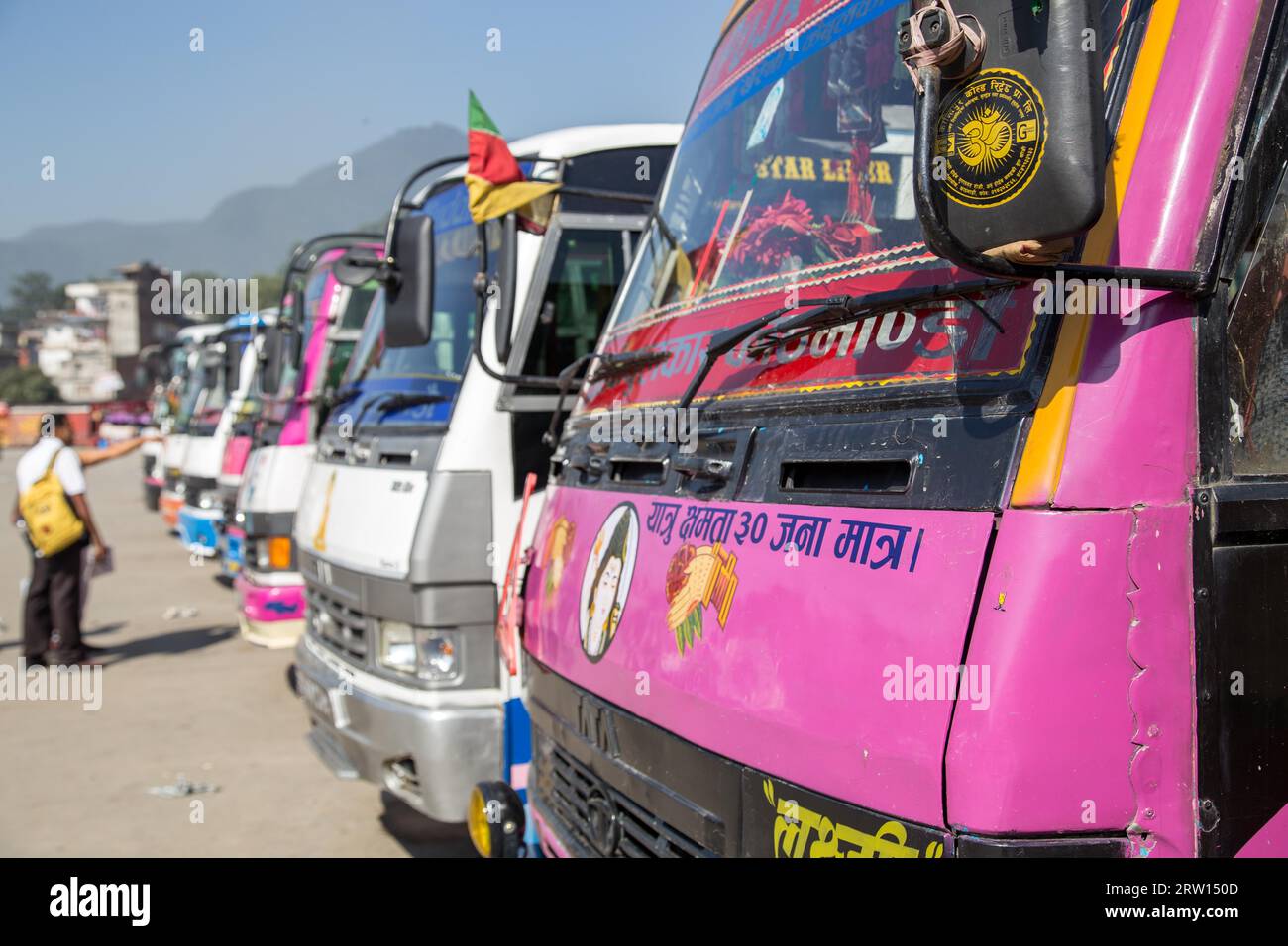 Kathmandu, Nepal, October 22, 2014: Several colorful buses parked at a ...