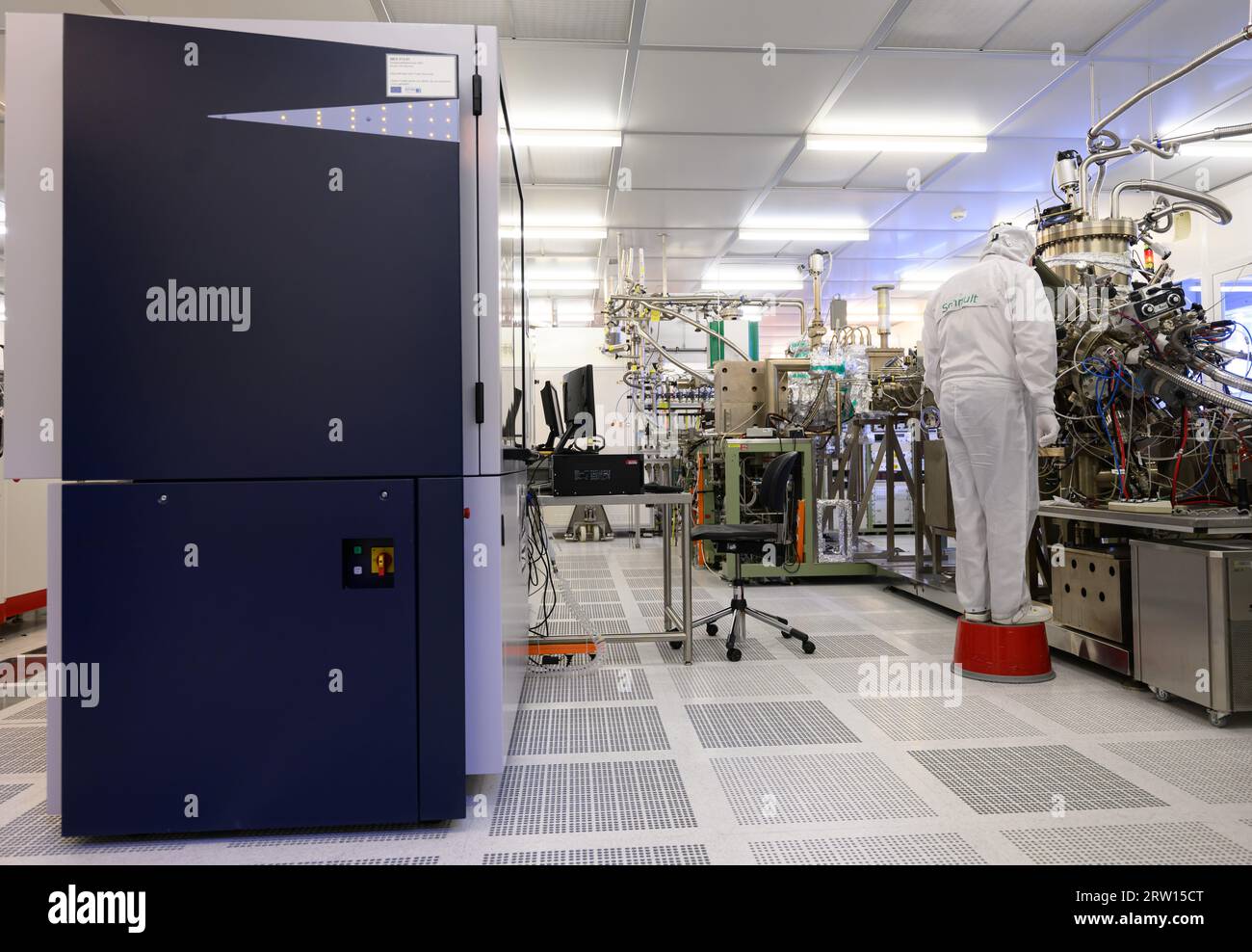Dresden, Germany. 13th Sep, 2023. An employee of the Nanoelectronic ...