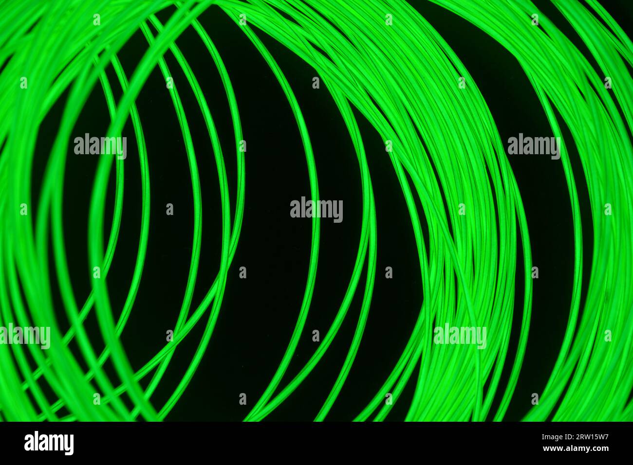 Bright and unusual photos of thin glowing wires, lime, yellow, green ...