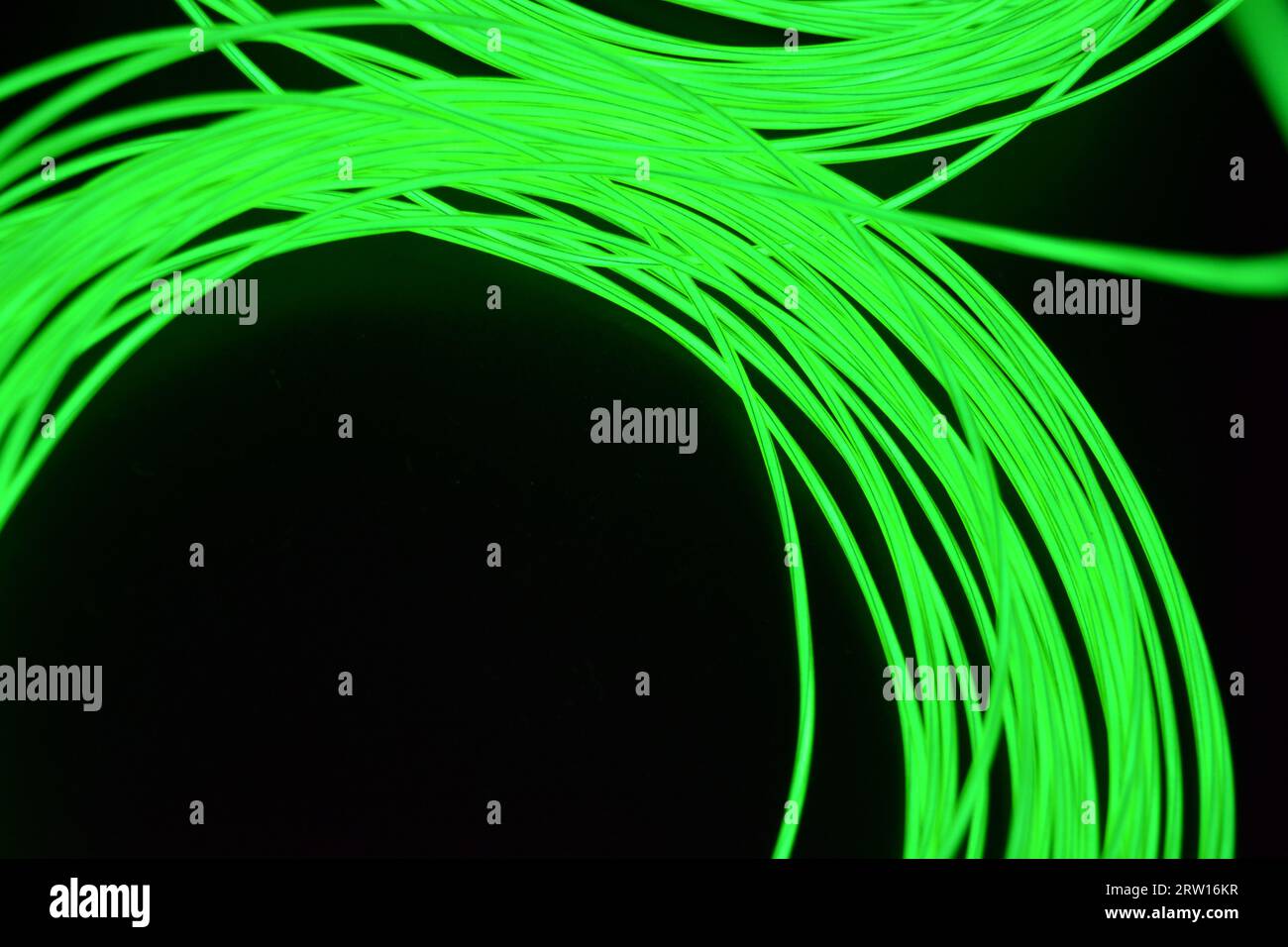 Bright and unusual photos of thin glowing wires, lime, yellow, green ...