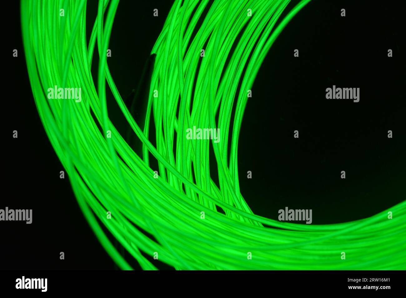 Bright and unusual photos of thin glowing wires, lime, yellow, green ...