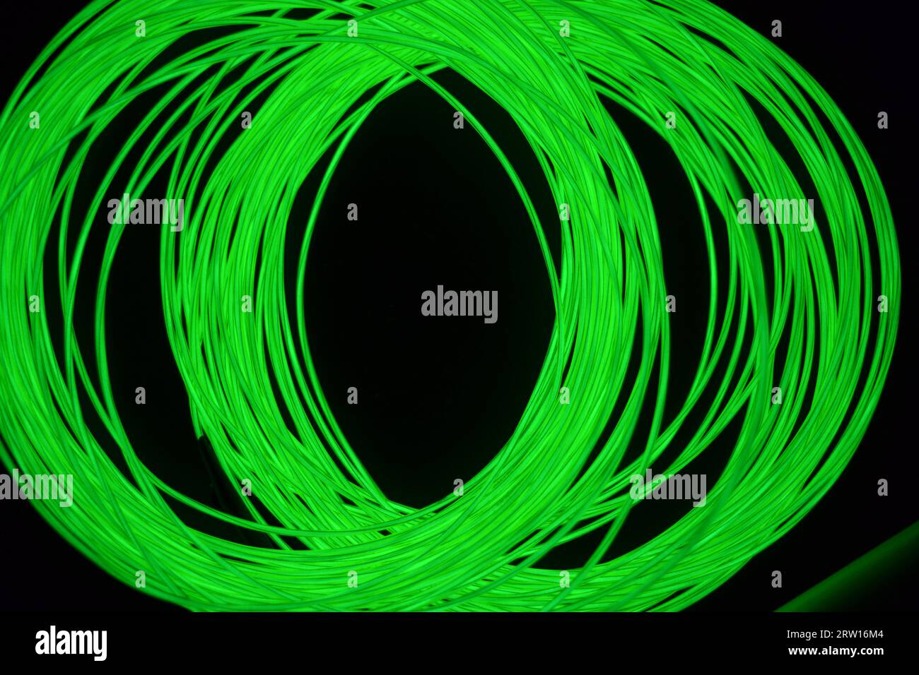 Bright and unusual photos of thin glowing wires, lime, yellow, green ...