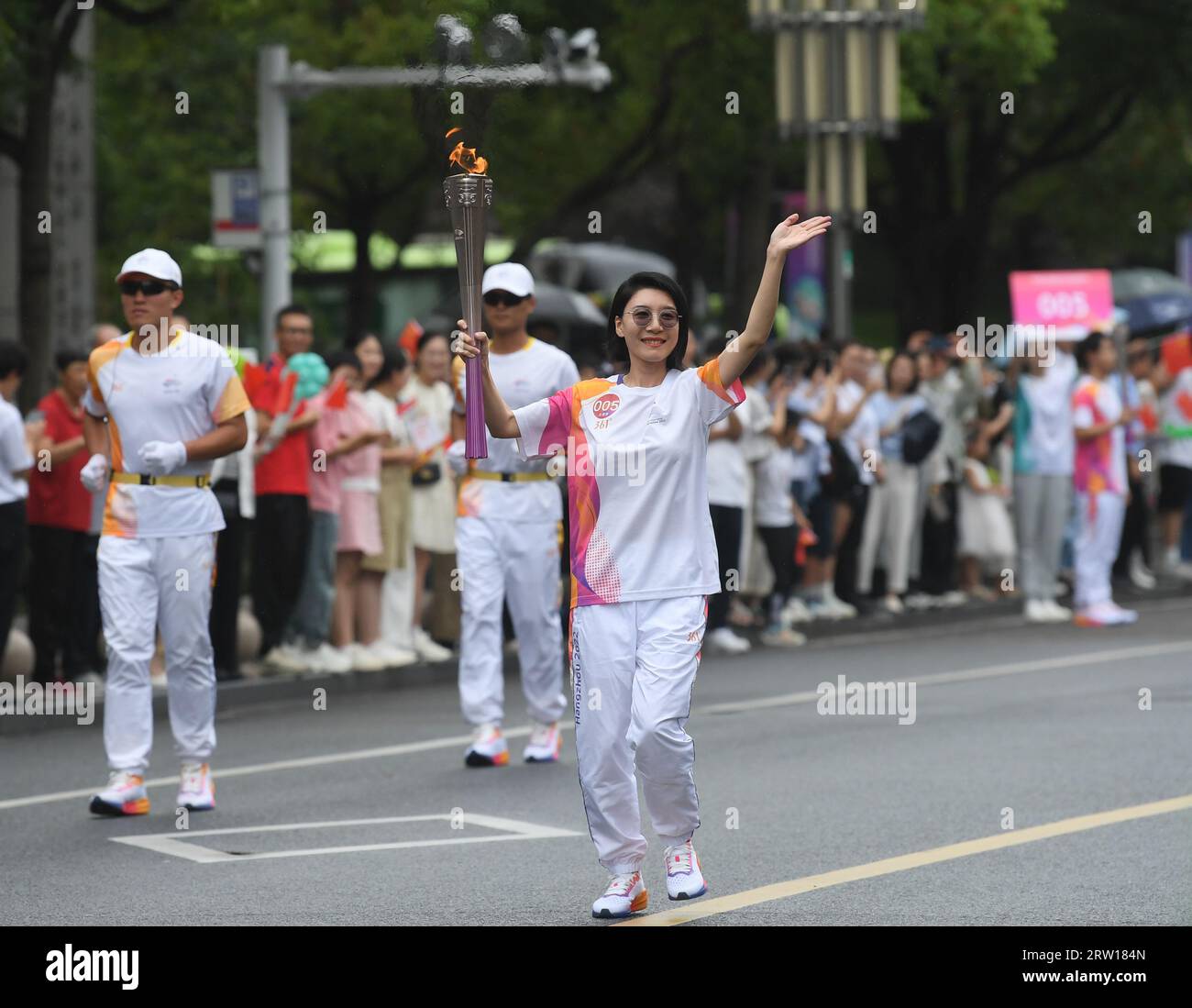 Lishui, China's Zhejiang Province. 16th Sep, 2023. Torch bearer He Bing ...