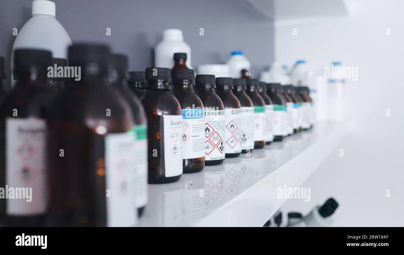Research, pharmaceutical chemical and bottle on shelf in laboratory ...
