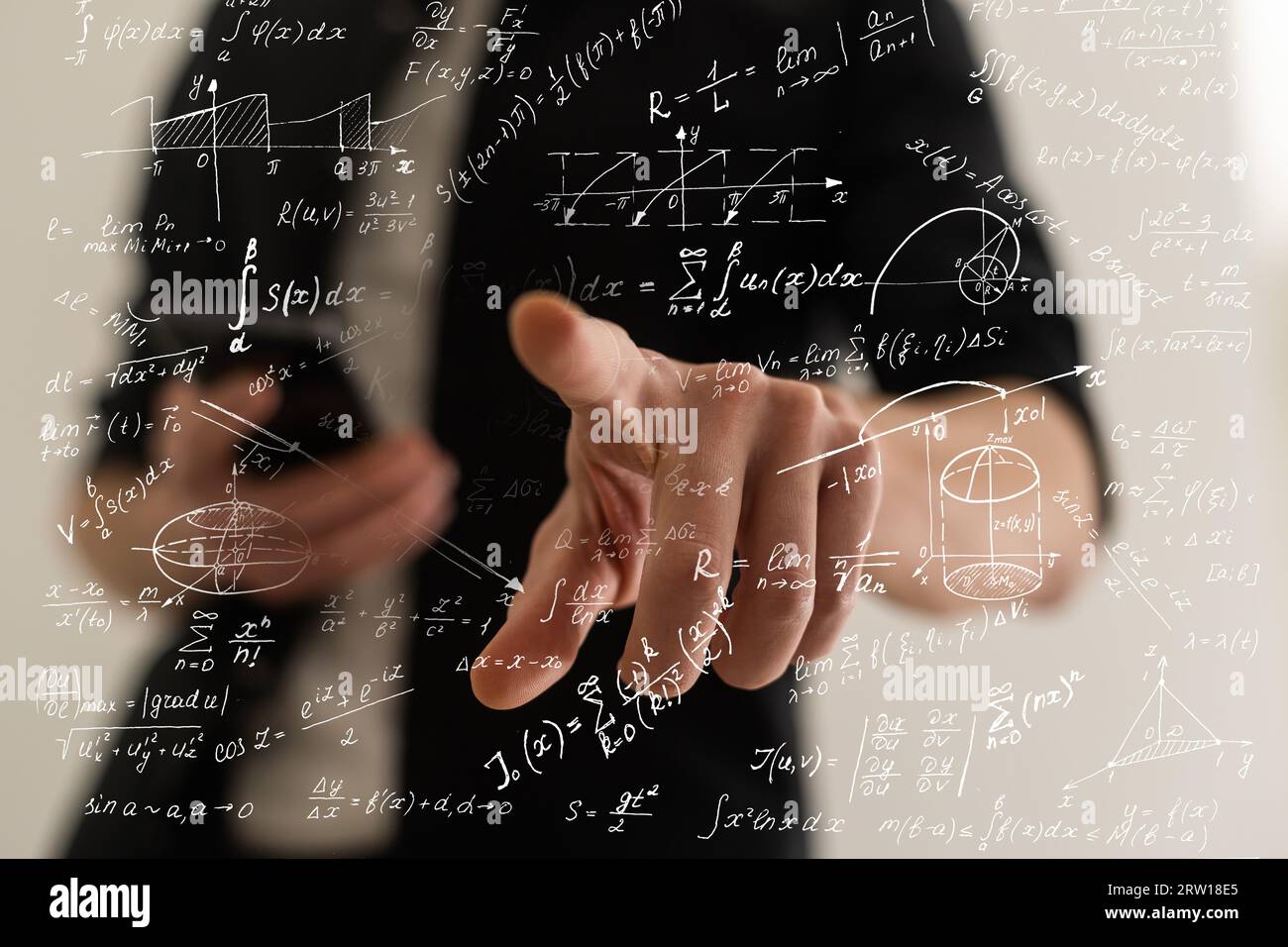 Businessman writing math formulas finger Stock Photo - Alamy