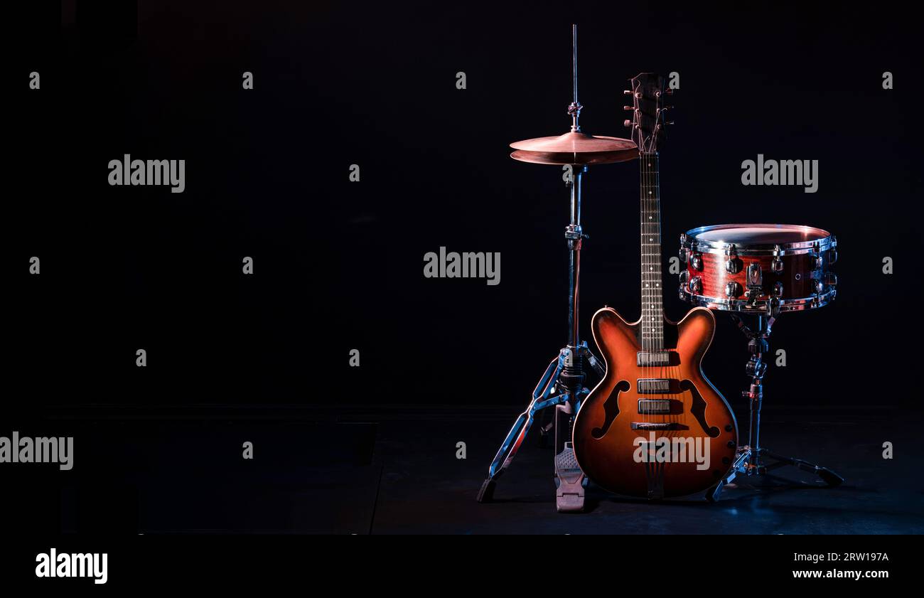 drum kit on stage on a dark background. Set of musical drums and ...