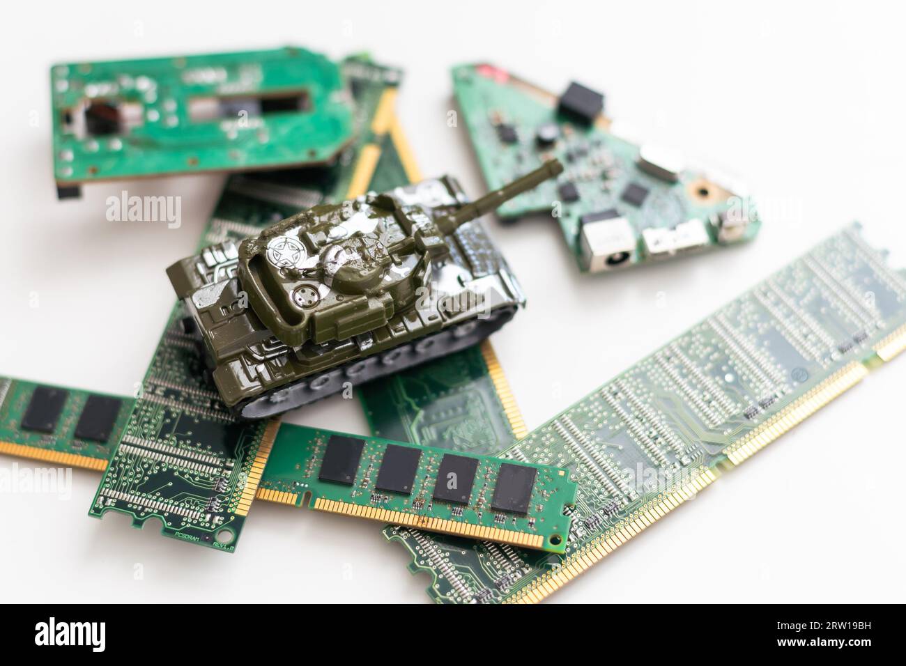 computer chips and a toy tank Stock Photo - Alamy