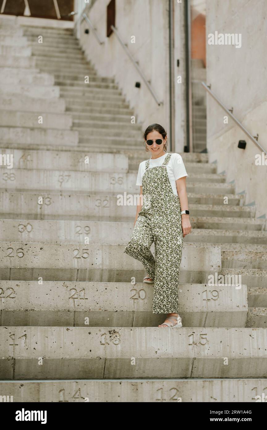 Girl coming down stairs hi-res stock photography and images - Alamy