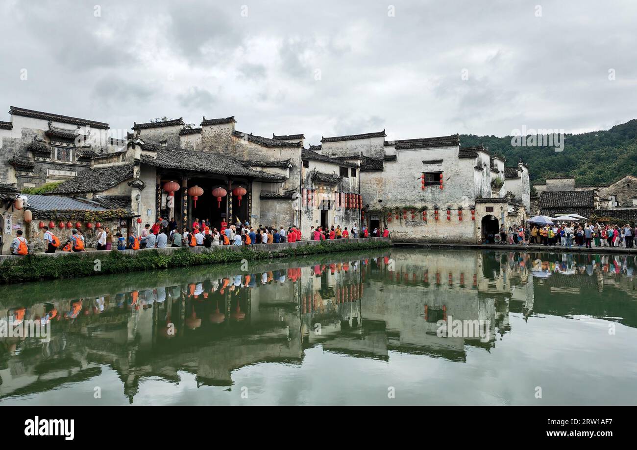 Huangshan. 13th Sep, 2023. People visit the Hongcun village in Yixian ...