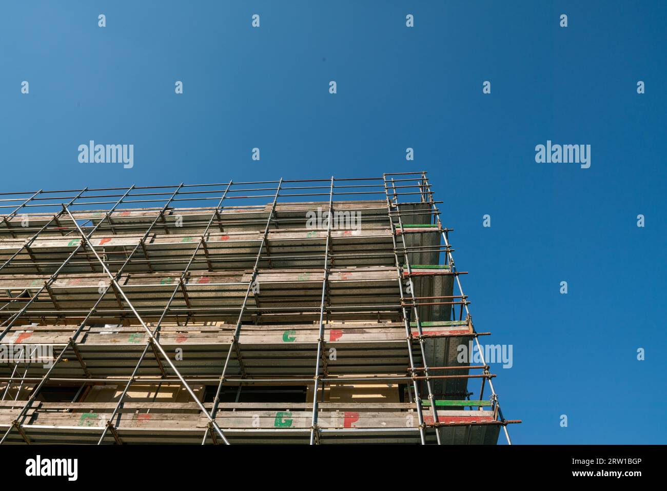 building with scaffolding, work in progress on the building which ...