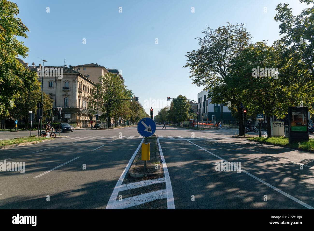 road with traffic dividers with nearby intersection, in the city ...