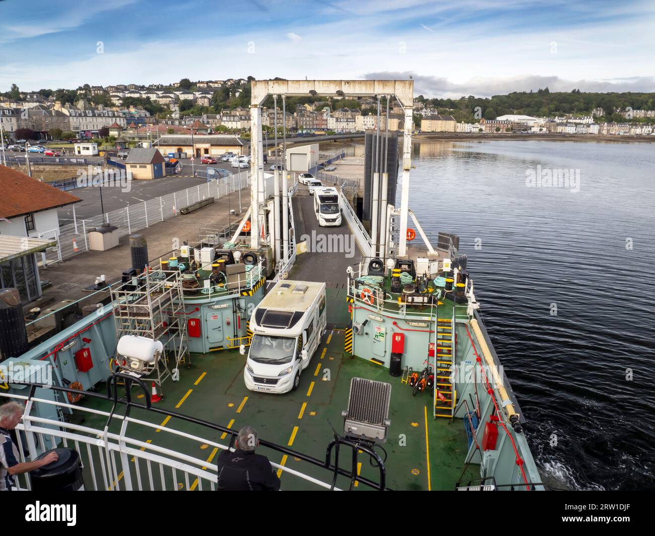 Camper vans boarding a ferry in the harbour in Rothesay on the Isle of ...