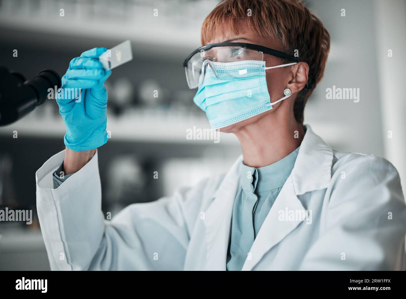 Microscope slide, woman and research with healthcare, mask and ...
