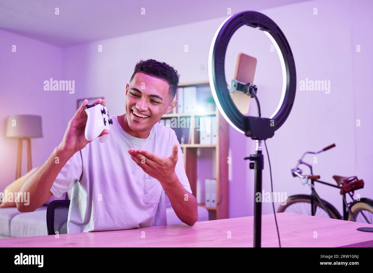 Streamer, live streaming and man gamer with review of console ...