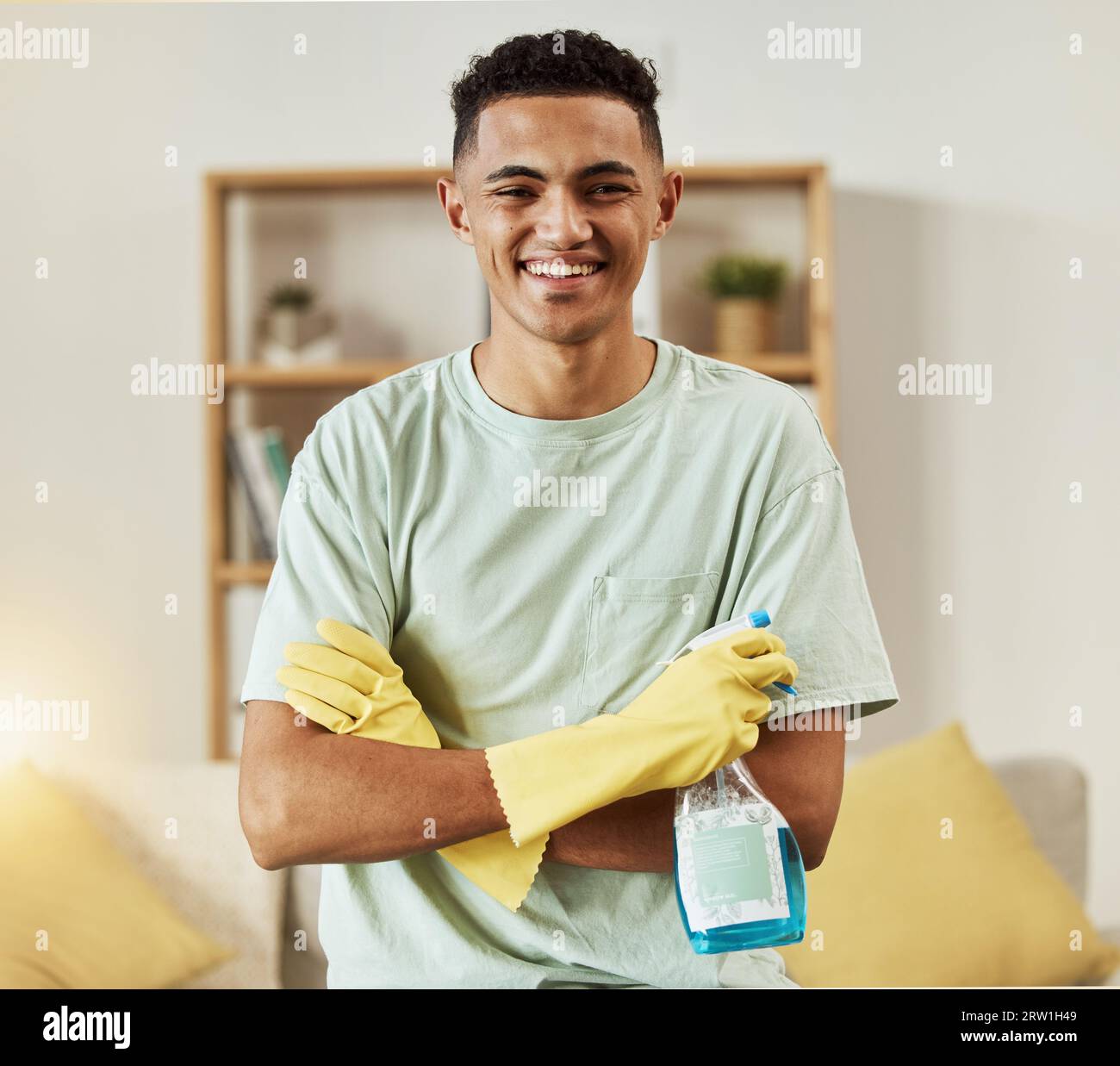 Cleaner, man in portrait and chemical with arms crossed, happy and ...