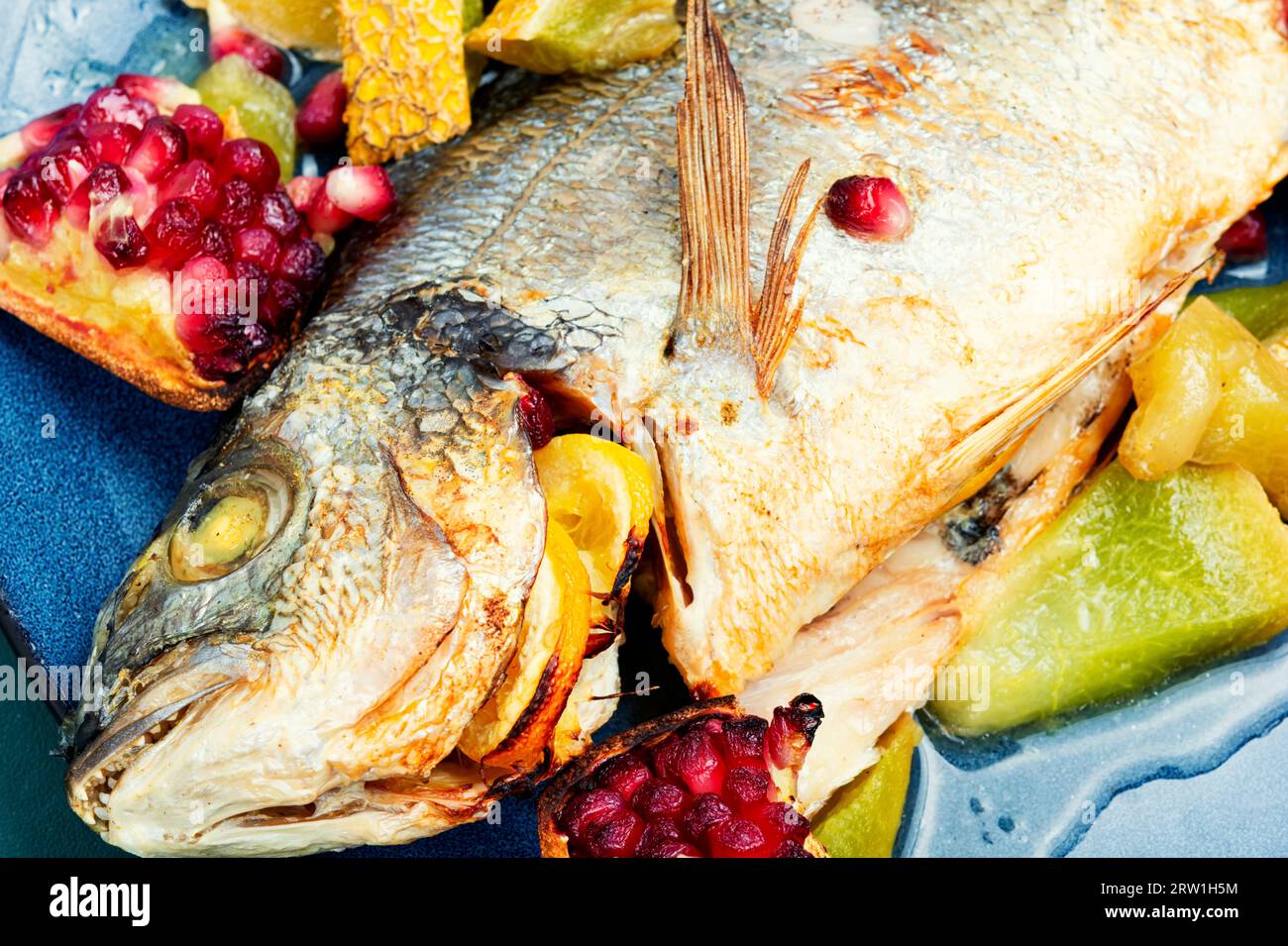 Pomegranate fish hi-res stock photography and images - Alamy