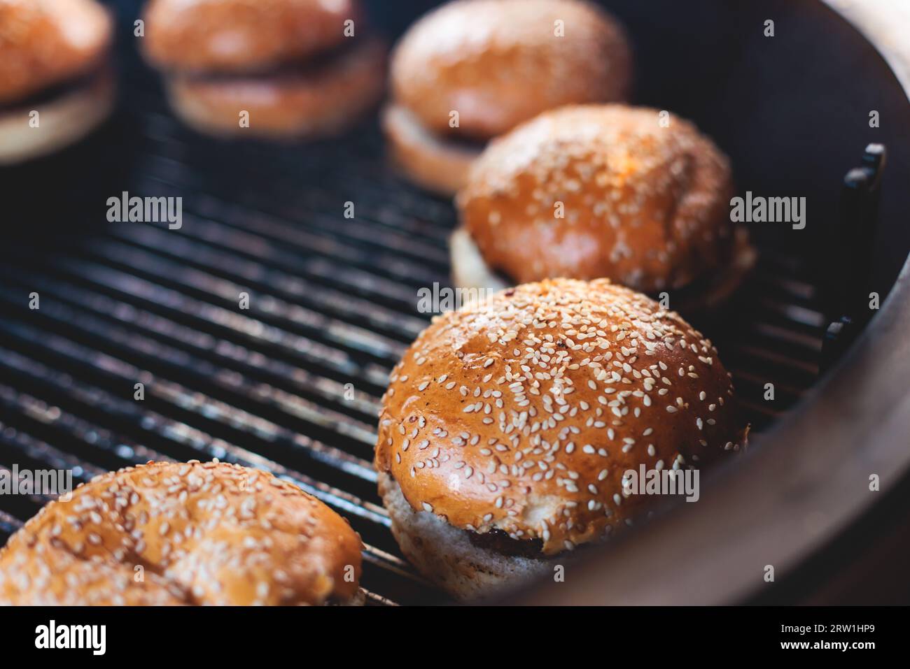 Hamburgers on gas grill hi-res stock photography and images - Alamy