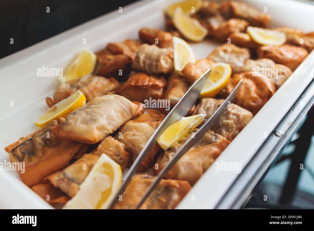 Beautifully decorated catering banquet table with different main course ...