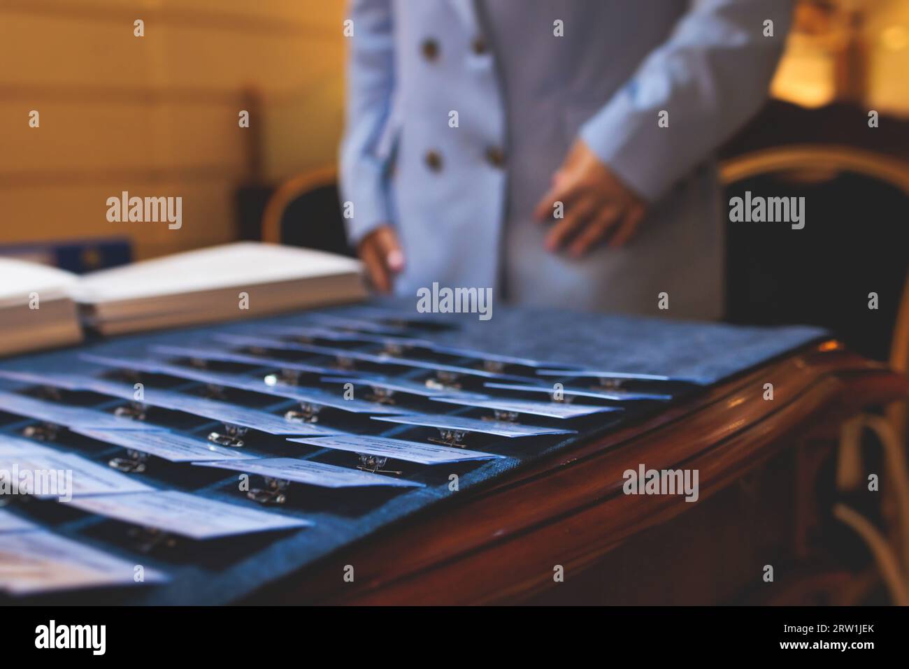 Registration desk table, process of checking in on a conference ...