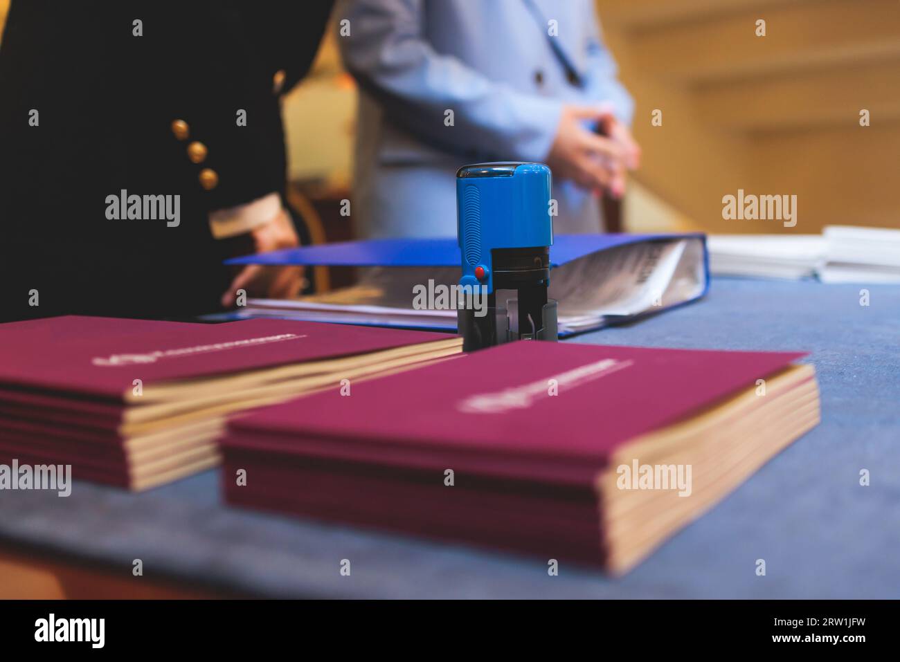 Registration desk table, process of checking in on a conference ...