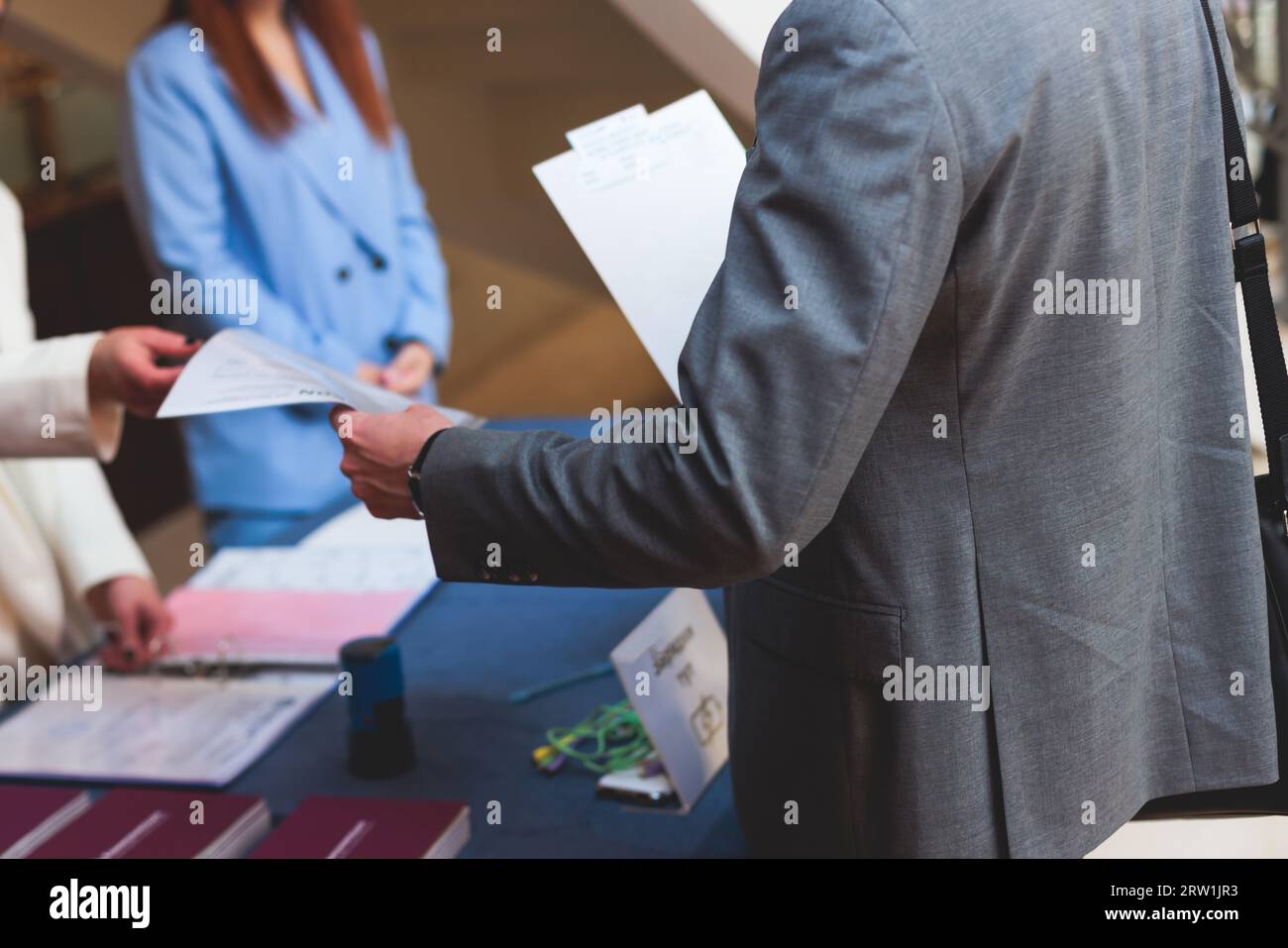 Process of checking in on a conference congress forum event ...