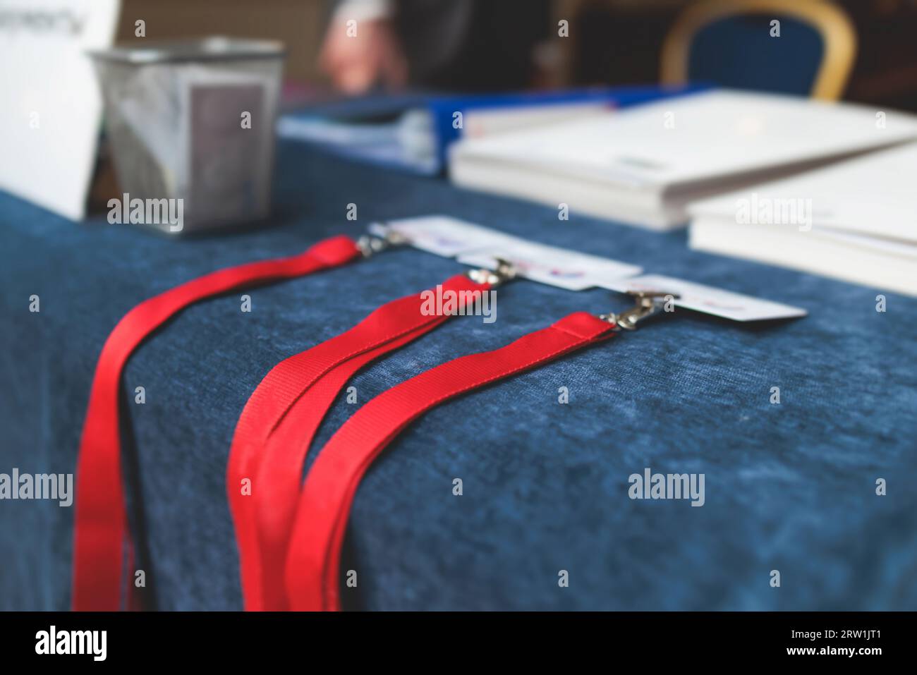 Registration desk table, process of checking in on a conference ...