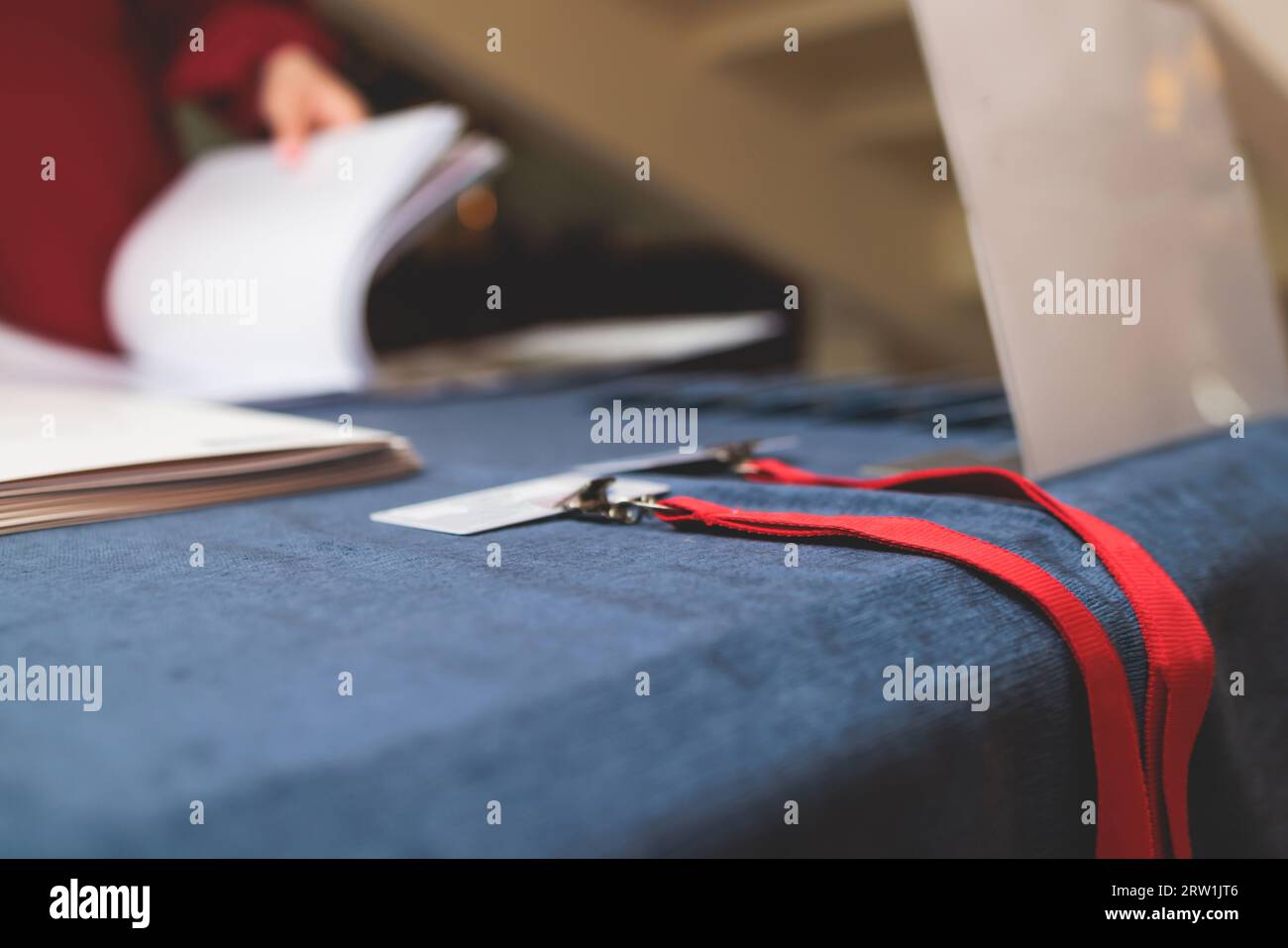 Registration desk table, process of checking in on a conference ...