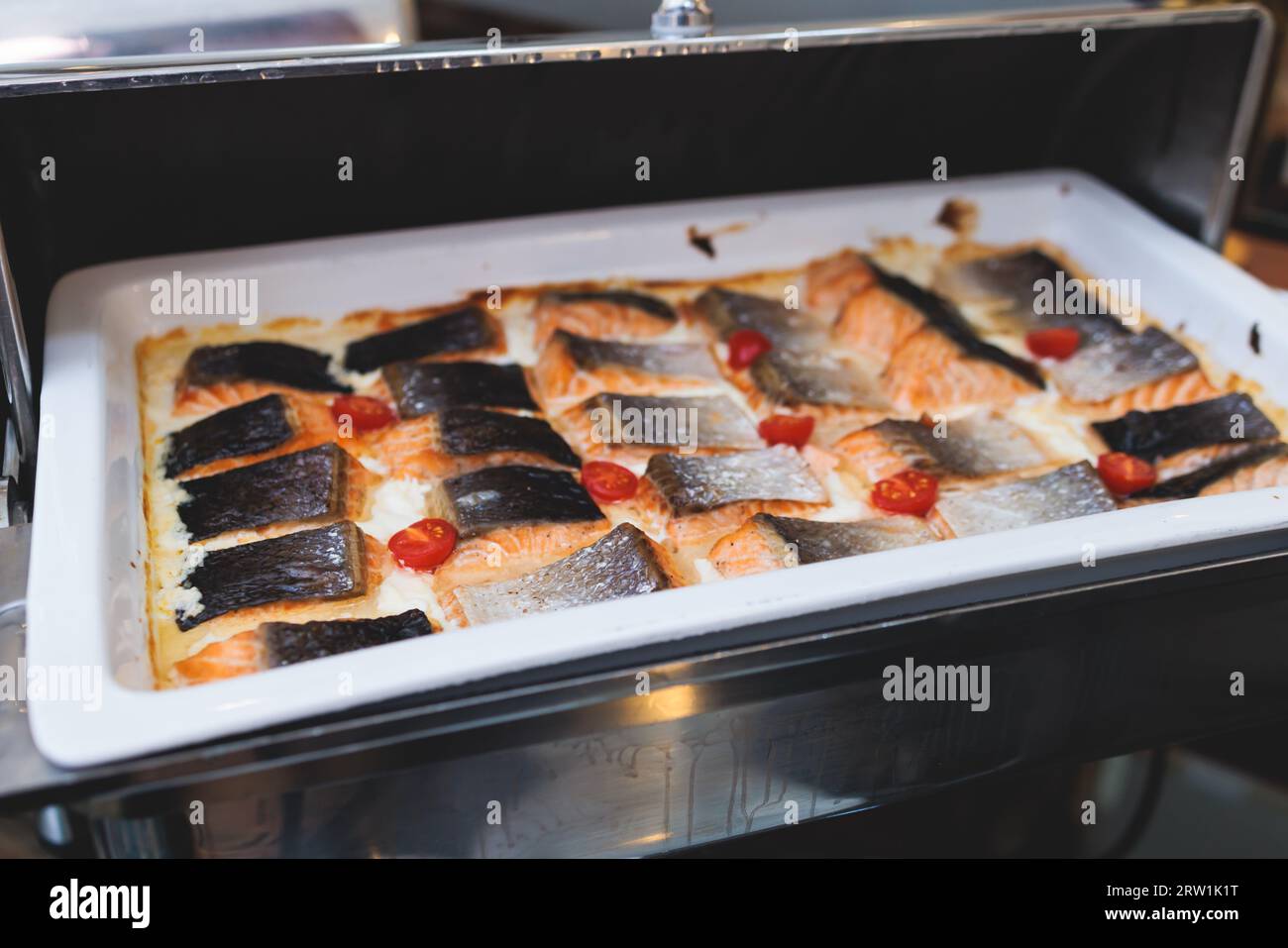 Beautifully decorated catering banquet table with different main course ...